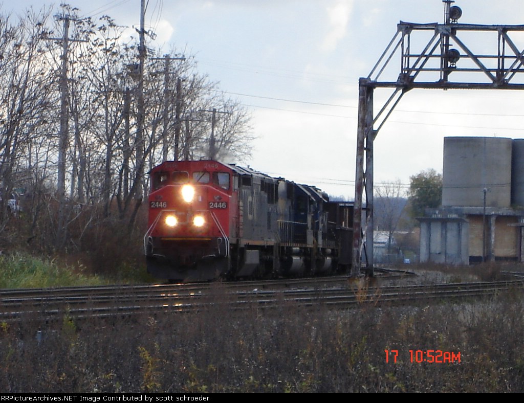CN 2446 works its way WB/NB with the CSX Q621